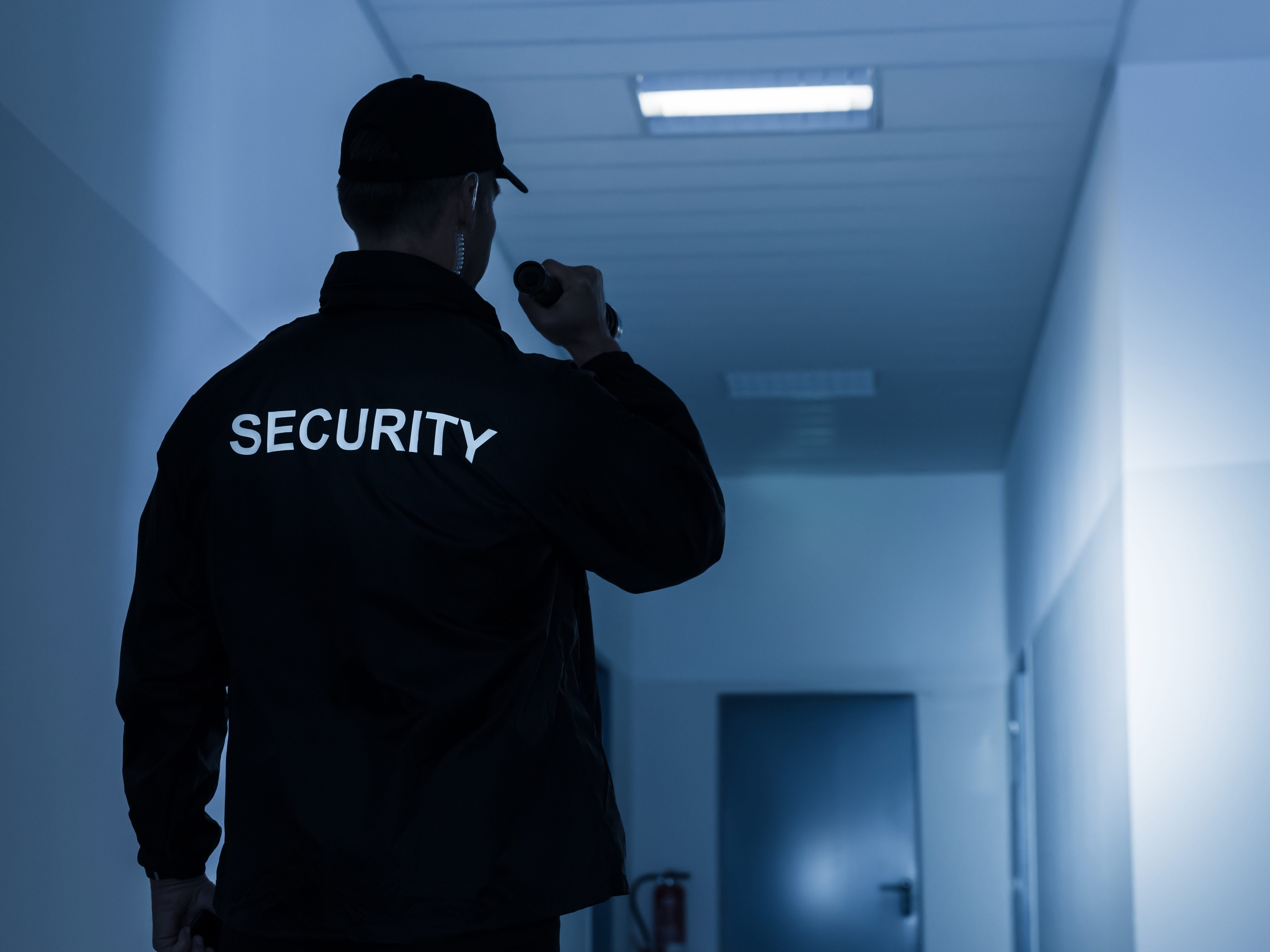 Security,Guard,Uniform,Using,Flashlight,At,Night,Doing,Surveillance ...
